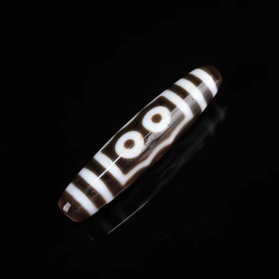 Dzi Beads: Ancient Tibetan Jewelry Imbued with Spiritual Energy