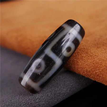 Dzi Beads: Ancient Tibetan Jewelry Imbued with Spiritual Energy