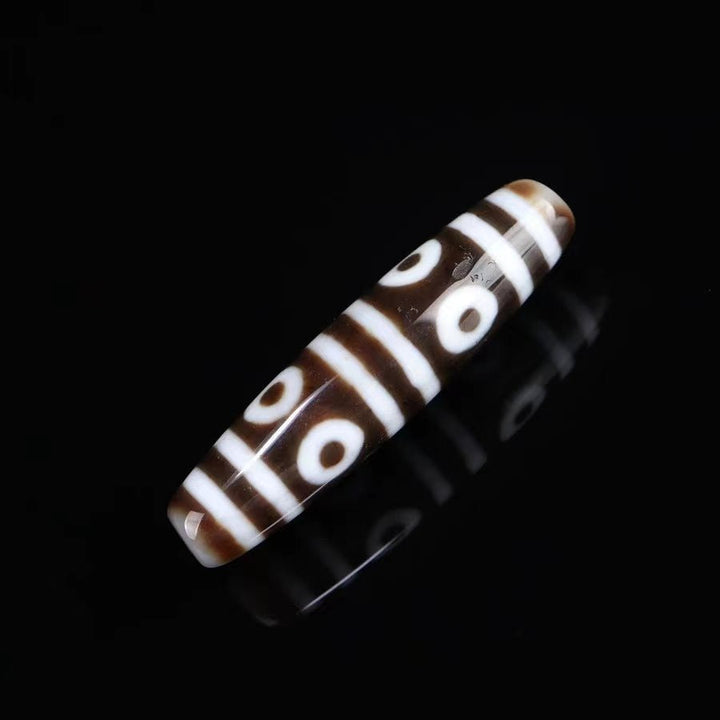 Dzi Beads: Ancient Tibetan Jewelry Imbued with Spiritual Energy