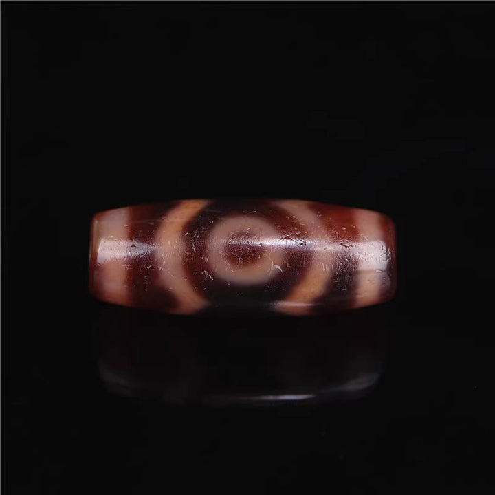 Dzi Beads: Ancient Tibetan Jewelry Imbued with Spiritual Energy